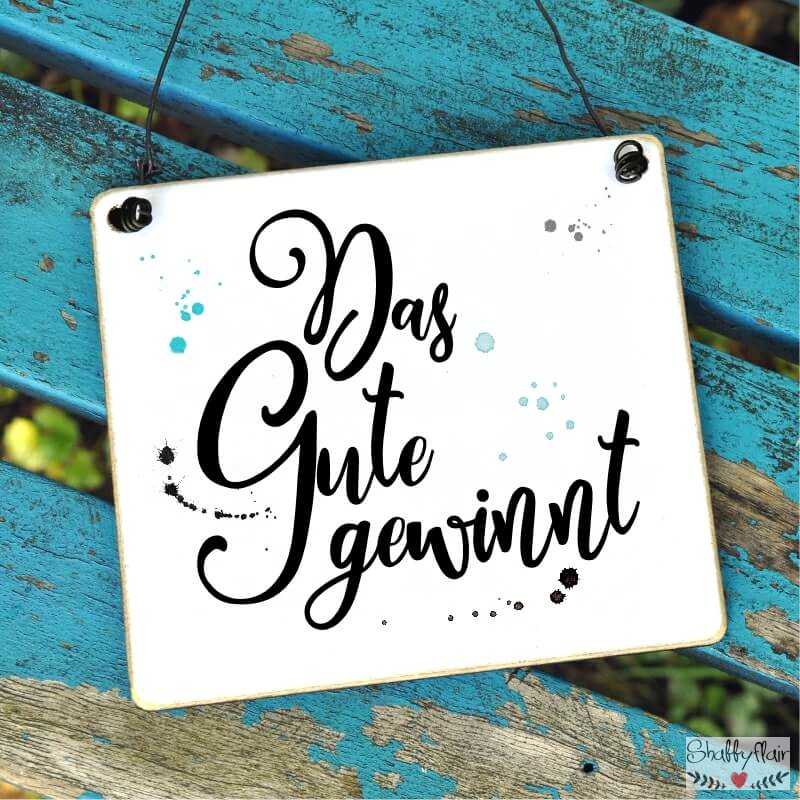 Schild mit Motivationsspruch Das Gute gewinnt
